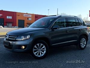 Grey Volkswagen Tiguan 2014 in Tartu, with an engine capacity of 2.00 L and mileage of 201 thousand km for 11899 €, photo 4 on AUTOMOTO.COM.LV