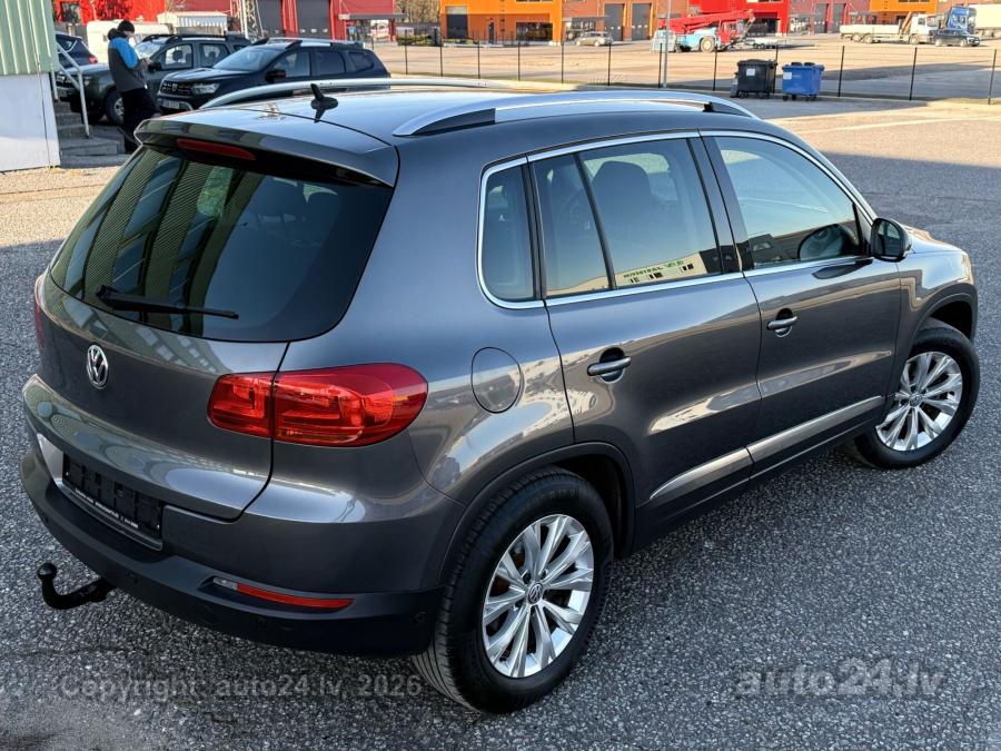 Grey Volkswagen Tiguan 2014 in Tartu, with an engine capacity of 2.00 L and mileage of 201 thousand km for 11899 €, photo 5 on AUTOMOTO.COM.LV