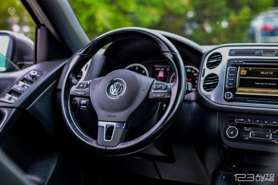 Grey Volkswagen Tiguan 2014 in Kretinga, with an engine capacity of 2.00 L and mileage of 286 thousand km for 11750 €, photo 14 on AUTOMOTO.COM.LV