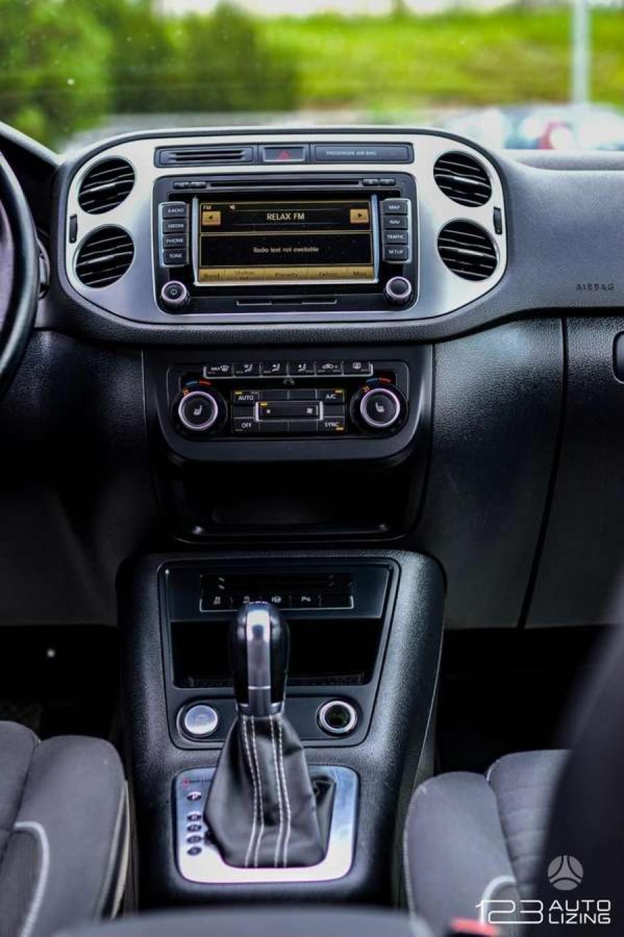 Grey Volkswagen Tiguan 2014 in Kretinga, with an engine capacity of 2.00 L and mileage of 286 thousand km for 11750 €, photo 15 on AUTOMOTO.COM.LV