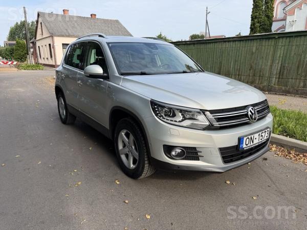 Grey Volkswagen Tiguan 2014 in Daugavpils, with an engine capacity of 2.00 L and mileage of 181 thousand km for 12950 €, photo 6 on AUTOMOTO.COM.LV