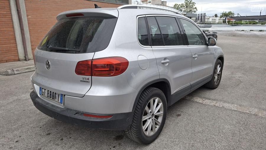 Grey Volkswagen Tiguan 2014 in Utena, with an engine capacity of 2.00 L and mileage of 216 thousand km for 8350 €, photo 7 on AUTOMOTO.COM.LV