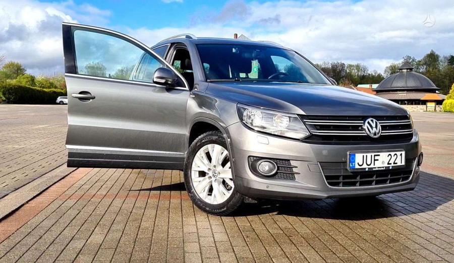 Grey Volkswagen Tiguan 2014 in Vilnius, with an engine capacity of 1.97 L and mileage of 382 thousand km for 7890 €, photo 3 on AUTOMOTO.COM.LV