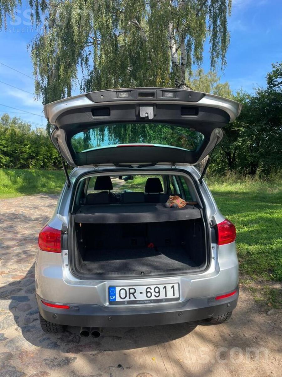 Grey Volkswagen Tiguan 2014 in Riga, with an engine capacity of 2.00 L and mileage of 277 thousand km for 6490 €, photo 6 on AUTOMOTO.COM.LV