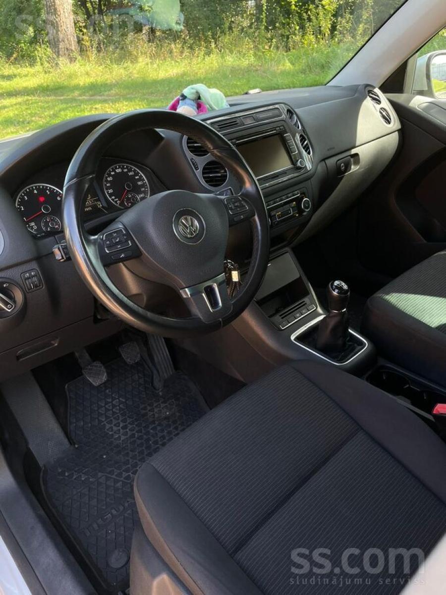 Grey Volkswagen Tiguan 2014 in Riga, with an engine capacity of 2.00 L and mileage of 277 thousand km for 6490 €, photo 10 on AUTOMOTO.COM.LV