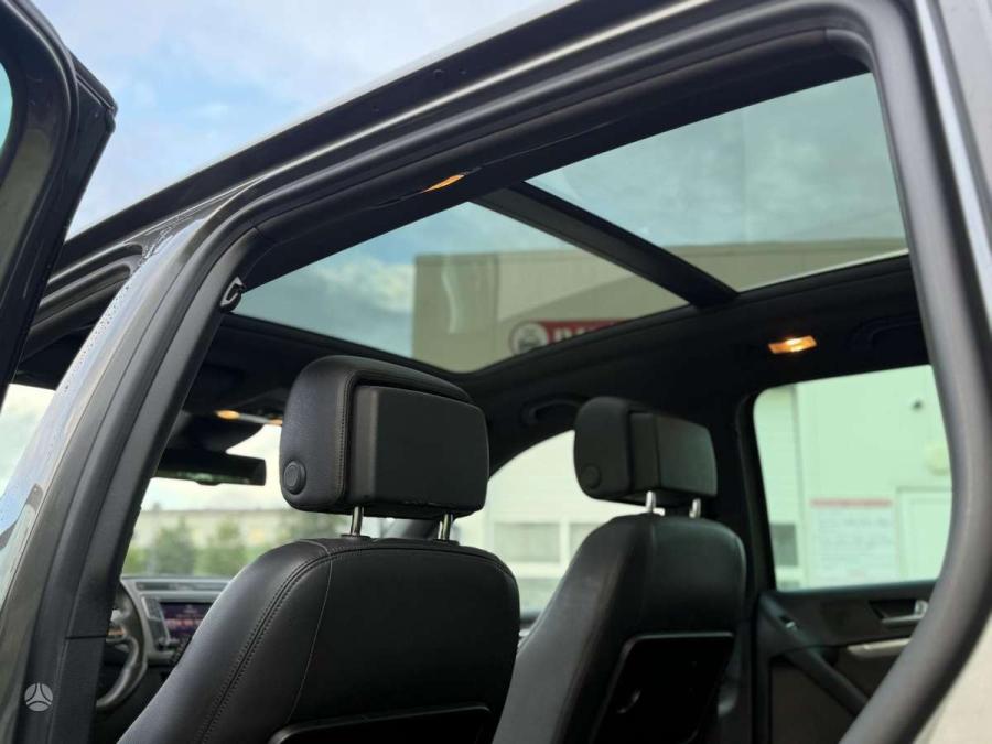 Grey Volkswagen Tiguan 2015 in Vilnius, with an engine capacity of 1.97 L and mileage of 255 thousand km for 11500 €, photo 22 on AUTOMOTO.COM.LV