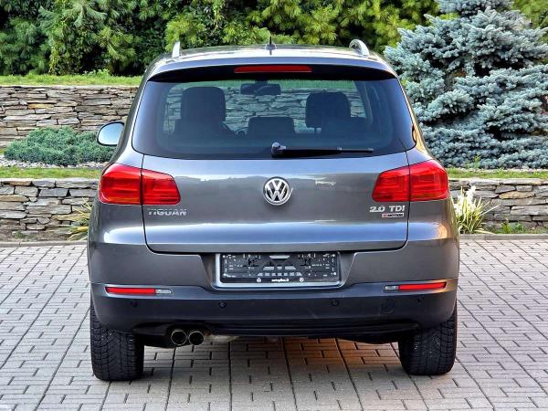 Grey Volkswagen Tiguan 2015 in Kedainiai, with an engine capacity of 1.97 L and mileage of 260 thousand km for 10500 €, photo 8 on AUTOMOTO.COM.LV