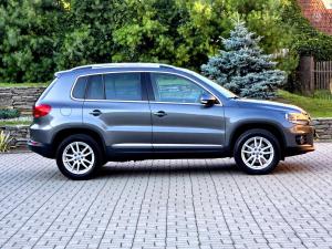 Grey Volkswagen Tiguan 2015 in Kedainiai, with an engine capacity of 1.97 L and mileage of 260 thousand km for 10500 €, photo 12 on AUTOMOTO.COM.LV
