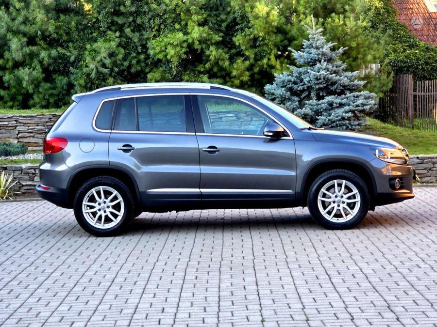 Grey Volkswagen Tiguan 2015 in Kedainiai, with an engine capacity of 1.97 L and mileage of 260 thousand km for 10500 €, photo 12 on AUTOMOTO.COM.LV