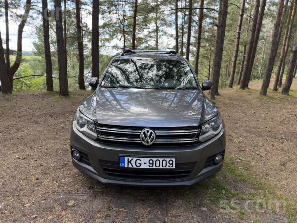 Grey Volkswagen Tiguan 2015 in Daugavpils, with an engine capacity of 1.40 L and mileage of 110 thousand km for 9950 €, photo 2 on AUTOMOTO.COM.LV