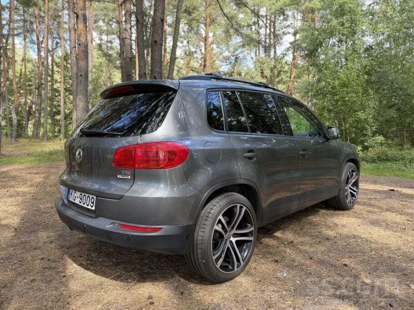 Grey Volkswagen Tiguan 2015 in Daugavpils, with an engine capacity of 1.40 L and mileage of 110 thousand km for 9950 €, photo 5 on AUTOMOTO.COM.LV