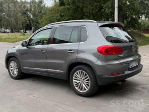 Grey Volkswagen Tiguan 2015 in Valmiera, with an engine capacity of 2.00 L and mileage of 334 thousand km for 7500 €, photo 6 on AUTOMOTO.COM.LV