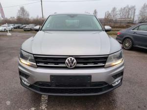 Grey Volkswagen Tiguan 2016 in Panevezys, with an engine capacity of 1.97 L and mileage of 211 thousand km for 13800 €, photo 3 on AUTOMOTO.COM.LV