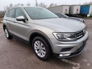 Grey Volkswagen Tiguan 2016 in Panevezys, with an engine capacity of 1.97 L and mileage of 211 thousand km for 13800 €, photo 4 on AUTOMOTO.COM.LV
