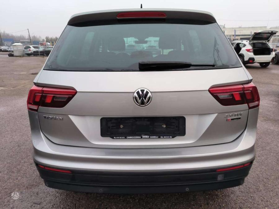 Grey Volkswagen Tiguan 2016 in Panevezys, with an engine capacity of 1.97 L and mileage of 211 thousand km for 13800 €, photo 7 on AUTOMOTO.COM.LV