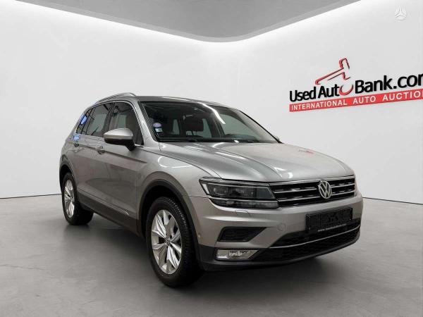 Grey Volkswagen Tiguan 2016 in Marijampole, with an engine capacity of 1.98 L and mileage of 213 thousand km for 15500 €, photo 3 on AUTOMOTO.COM.LV