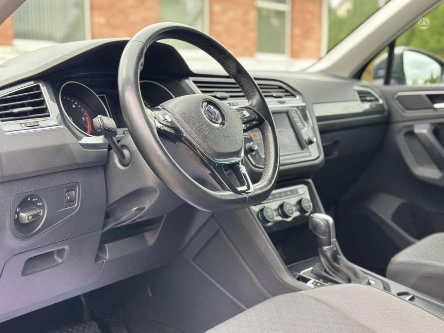 Grey Volkswagen Tiguan 2016 in Nemencine, with an engine capacity of 1.97 L and mileage of 286 thousand km for 14300 €, photo 35 on AUTOMOTO.COM.LV
