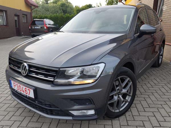 Grey Volkswagen Tiguan 2016 in Trakai, with an engine capacity of 1.97 L and mileage of 324 thousand km for 11990 €, photo 6 on AUTOMOTO.COM.LV