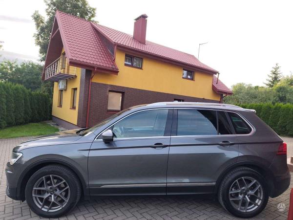 Grey Volkswagen Tiguan 2016 in Trakai, with an engine capacity of 1.97 L and mileage of 324 thousand km for 11990 €, photo 10 on AUTOMOTO.COM.LV