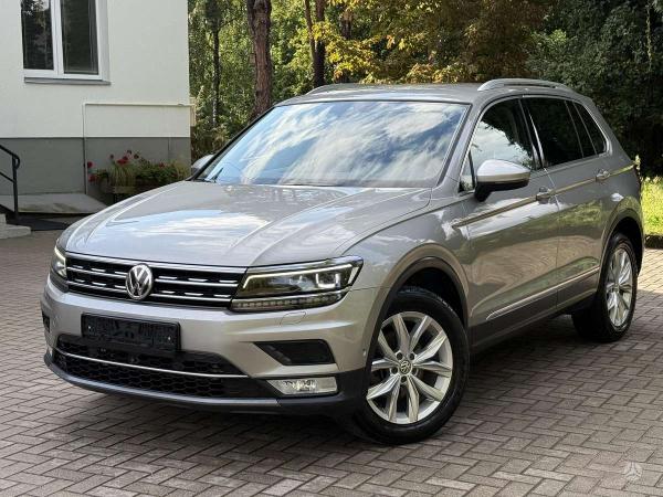 Grey Volkswagen Tiguan 2016 in Prienai, with an engine capacity of 1.97 L and mileage of 270 thousand km for 14250 €, photo 1 on AUTOMOTO.COM.LV