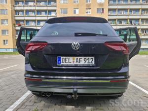 Grey Volkswagen Tiguan 2016 in Riga, with an engine capacity of 2.00 L and mileage of 162 thousand km for 15500 €, photo 4 on AUTOMOTO.COM.LV