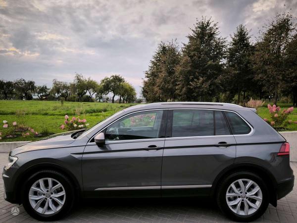 Grey Volkswagen Tiguan 2016 in Vilnius, with an engine capacity of 1.97 L and mileage of 300 thousand km for 11490 €, photo 4 on AUTOMOTO.COM.LV