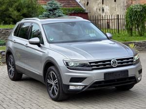Grey Volkswagen Tiguan 2017 in Vilnius, with an engine capacity of 2.00 L and mileage of 213 thousand km for 14999 €, photo  on AUTOMOTO.COM.LV