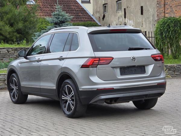 Grey Volkswagen Tiguan 2017 in Vilnius, with an engine capacity of 2.00 L and mileage of 213 thousand km for 14999 €, photo 6 on AUTOMOTO.COM.LV