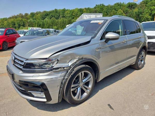 Grey Volkswagen Tiguan 2017 in Vilnius, with an engine capacity of 1.97 L and mileage of 238 thousand km for 15500 €, photo 2 on AUTOMOTO.COM.LV
