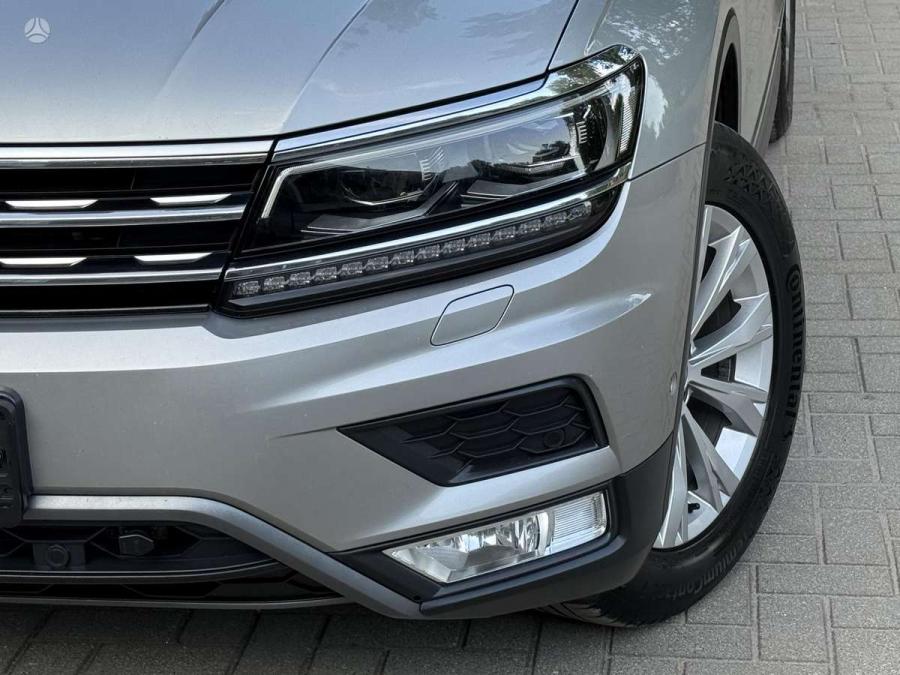 Grey Volkswagen Tiguan 2017 in Prienai, with an engine capacity of 1.97 L and mileage of 258 thousand km for 13350 €, photo 19 on AUTOMOTO.COM.LV