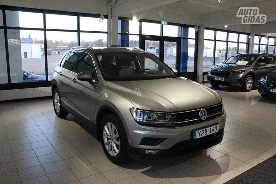Grey Volkswagen Tiguan 2018 in Kaunas, with an engine capacity of 0.00 L and mileage of 80 thousand km for 23269 €, photo 4 on AUTOMOTO.COM.LV