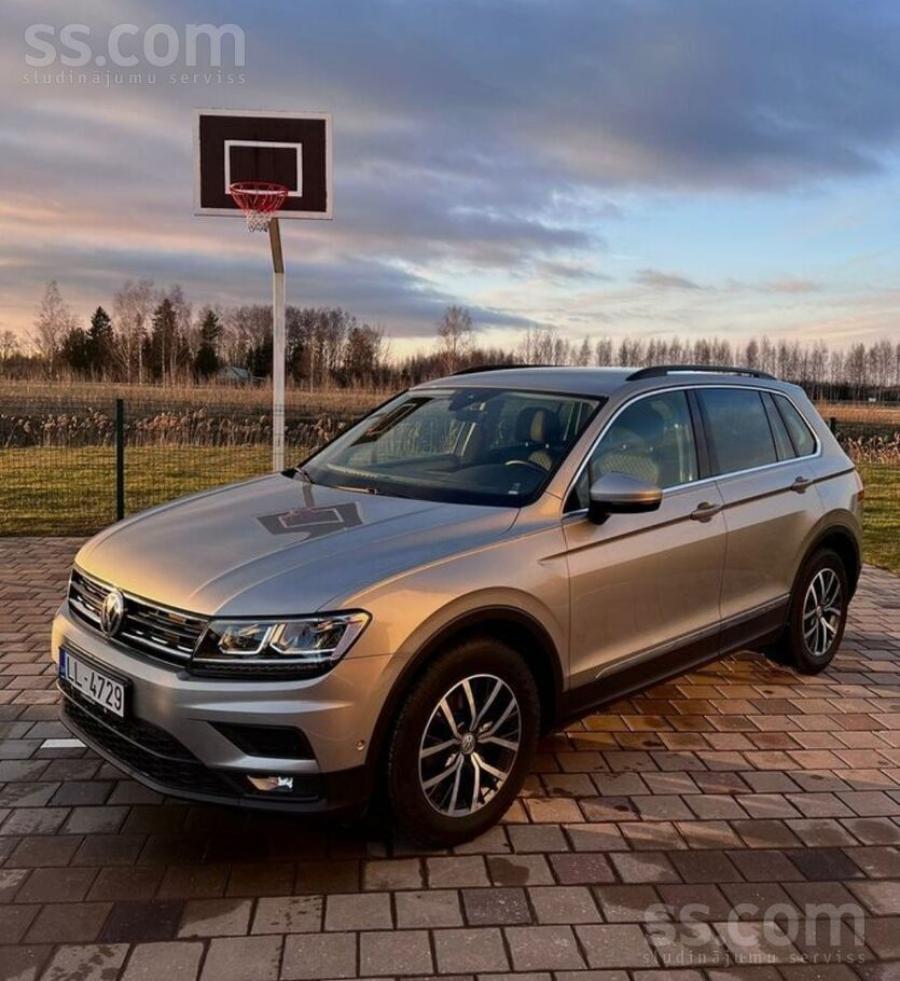 Pelēks Volkswagen Tiguan 2018 Rīga, ar dzinēja tilpumu 1.40 L un nobraukumu 98 tūkst. km par 19900 €, foto 1 vietnē AUTOMOTO.COM.LV