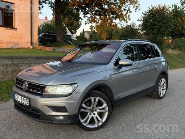 Grey Volkswagen Tiguan 2018 in Valmiera, with an engine capacity of 2.00 L and mileage of 392 thousand km for 9800 €, photo 6 on AUTOMOTO.COM.LV