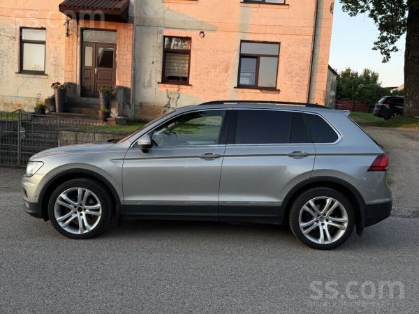 Grey Volkswagen Tiguan 2018 in Valmiera, with an engine capacity of 2.00 L and mileage of 392 thousand km for 9800 €, photo 8 on AUTOMOTO.COM.LV