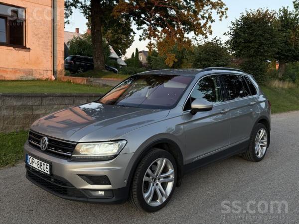 Grey Volkswagen Tiguan 2018 in Valmiera, with an engine capacity of 2.00 L and mileage of 392 thousand km for 9800 €, photo 9 on AUTOMOTO.COM.LV