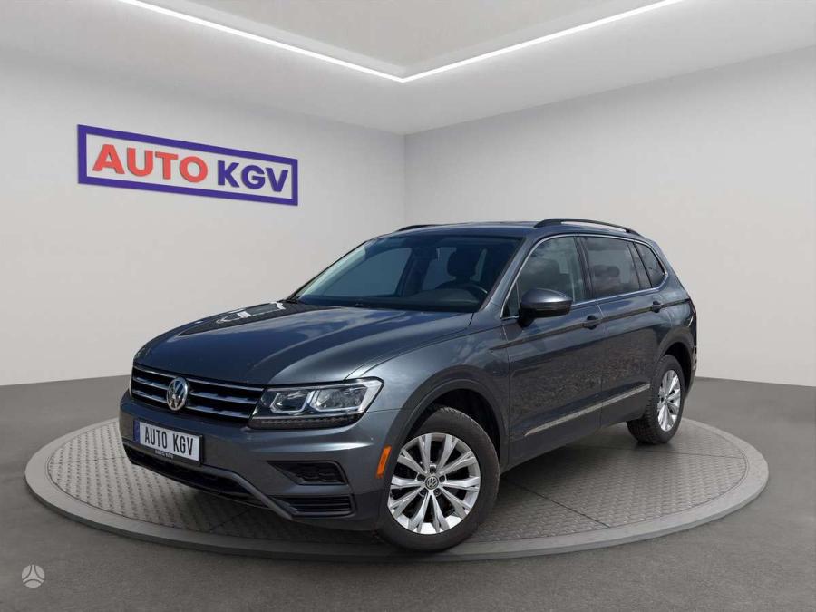 Grey Volkswagen Tiguan 2018 in Kaunas, with an engine capacity of 2.00 L and mileage of 295 thousand km for 14999 €, photo 1 on AUTOMOTO.COM.LV