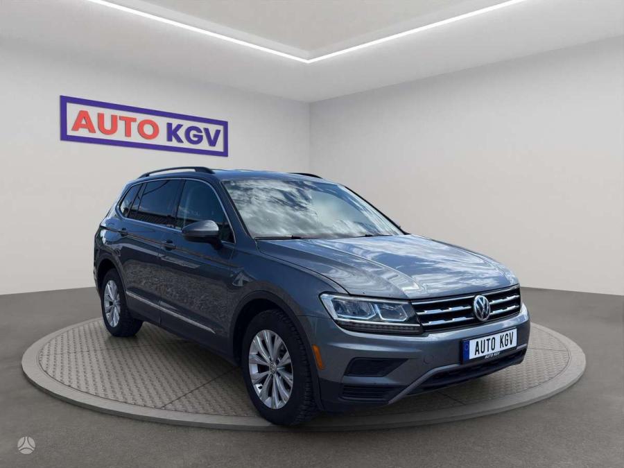 Grey Volkswagen Tiguan 2018 in Kaunas, with an engine capacity of 2.00 L and mileage of 295 thousand km for 14999 €, photo 8 on AUTOMOTO.COM.LV