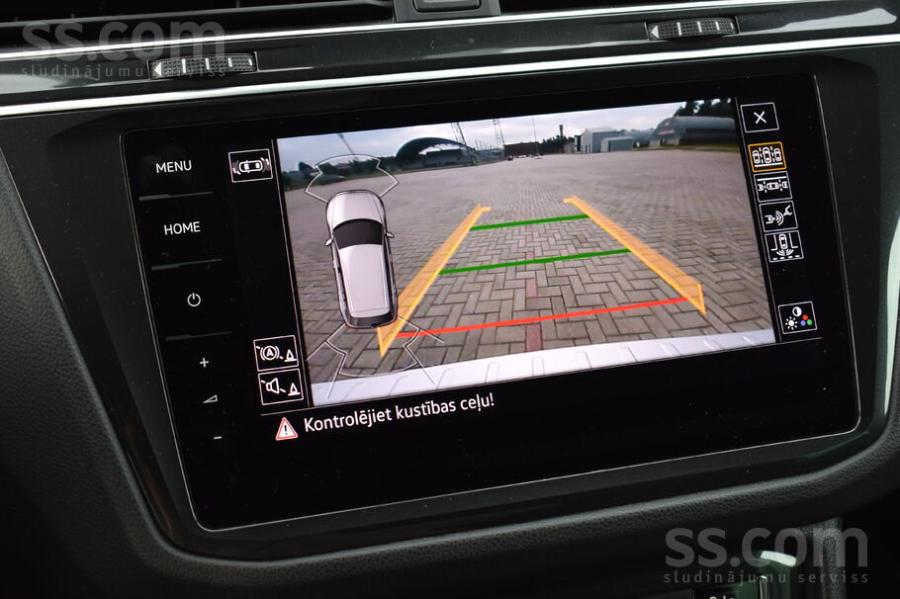 Grey Volkswagen Tiguan 2018 in Valmiera, with an engine capacity of 2.00 L and mileage of 232 thousand km for 18500 €, photo 18 on AUTOMOTO.COM.LV