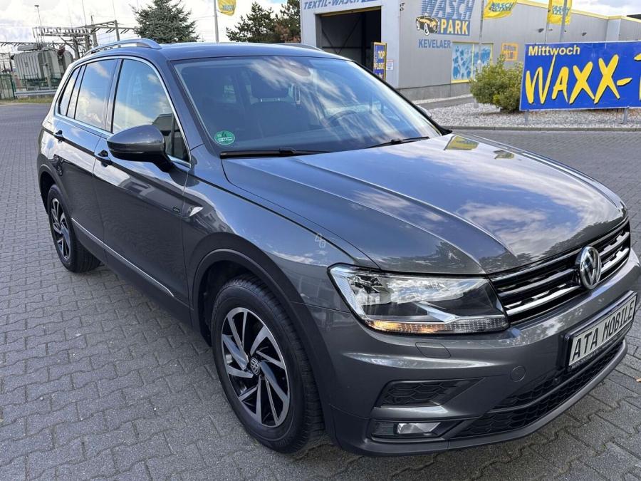Grey Volkswagen Tiguan 2019 in Kaunas, with an engine capacity of 1.50 L and mileage of 42 thousand km for 27549 €, photo 28 on AUTOMOTO.COM.LV