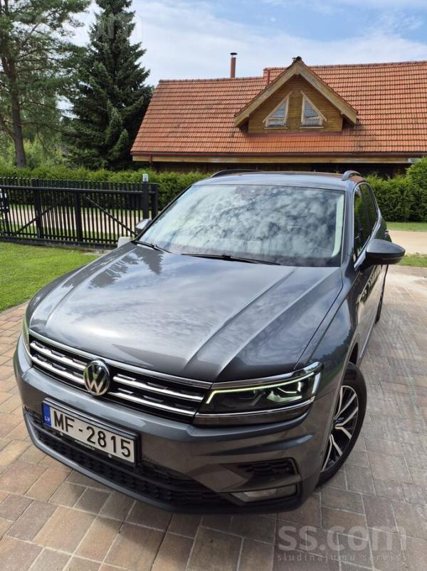 Grey Volkswagen Tiguan 2019 in Riga, with an engine capacity of 2.00 L and mileage of 107 thousand km for 19900 €, photo 1 on AUTOMOTO.COM.LV