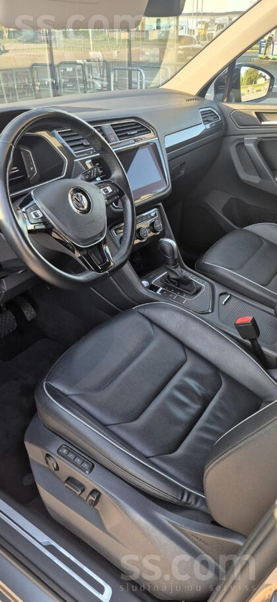 Grey Volkswagen Tiguan 2019 in Riga, with an engine capacity of 2.00 L and mileage of 108 thousand km for 21490 €, photo 7 on AUTOMOTO.COM.LV