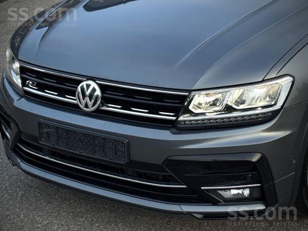 Grey Volkswagen Tiguan 2019 in Riga, with an engine capacity of 2.00 L and mileage of 254 thousand km for 18950 €, photo 1 on AUTOMOTO.COM.LV