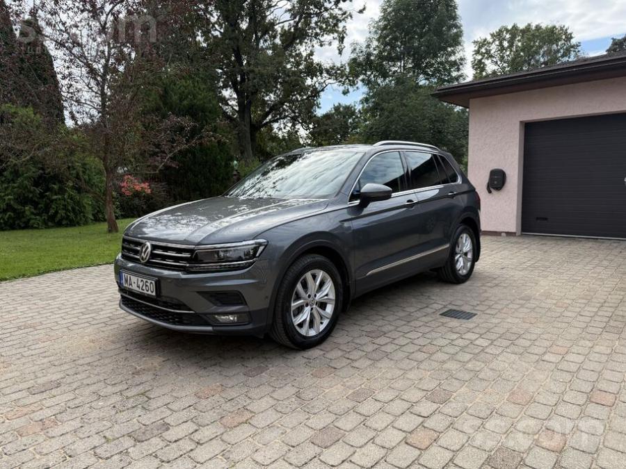 Grey Volkswagen Tiguan 2019 in Jurmala, with an engine capacity of 2.00 L and mileage of 55 thousand km for 20800 €, photo 1 on AUTOMOTO.COM.LV