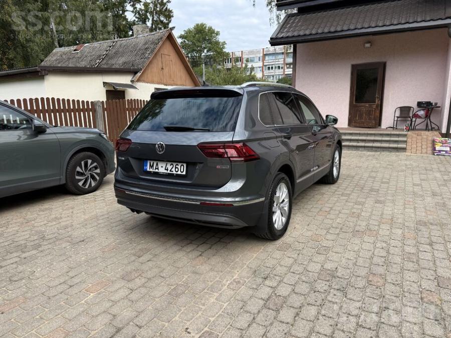 Grey Volkswagen Tiguan 2019 in Jurmala, with an engine capacity of 2.00 L and mileage of 55 thousand km for 20800 €, photo 4 on AUTOMOTO.COM.LV