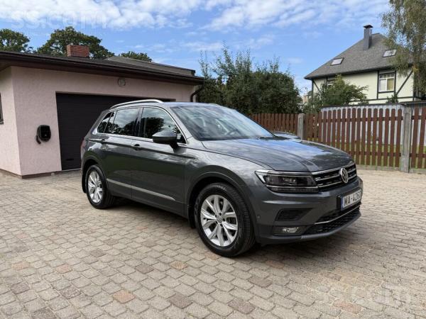 Grey Volkswagen Tiguan 2019 in Jurmala, with an engine capacity of 2.00 L and mileage of 55 thousand km for 20800 €, photo 3 on AUTOMOTO.COM.LV