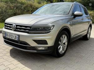 Grey Volkswagen Tiguan 2020 in Vilnius, with an engine capacity of 2.00 L and mileage of 265 thousand km for 13800 €, photo  on AUTOMOTO.COM.LV