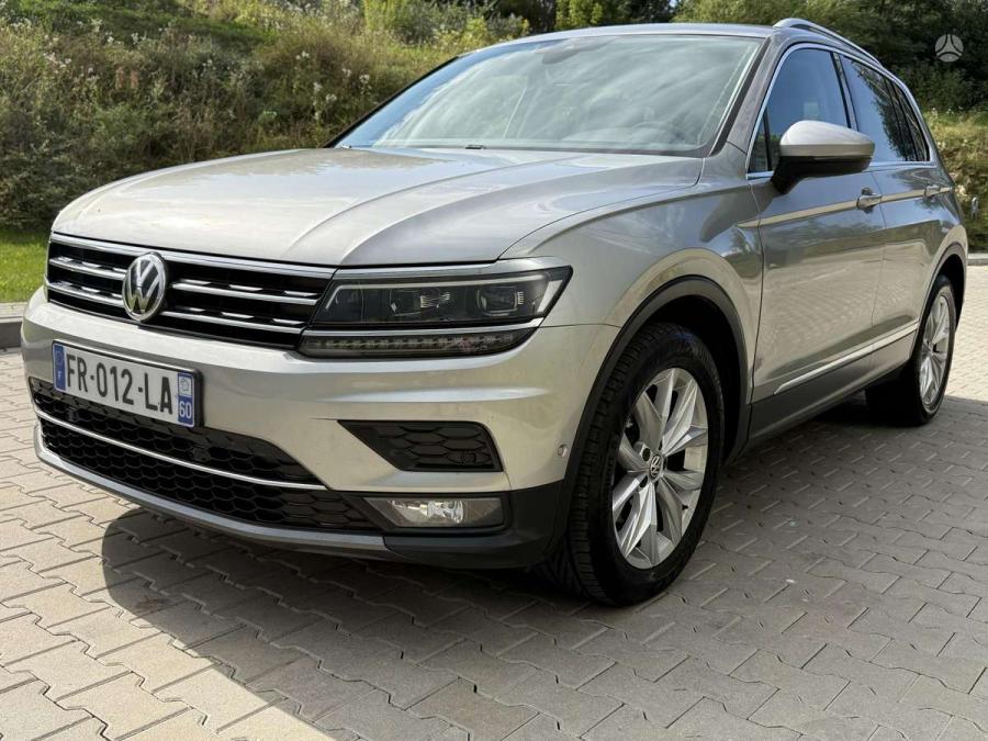 Grey Volkswagen Tiguan 2020 in Vilnius, with an engine capacity of 2.00 L and mileage of 265 thousand km for 13800 €, photo 1 on AUTOMOTO.COM.LV