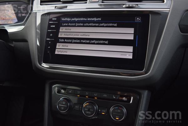 Grey Volkswagen Tiguan 2020 in Riga, with an engine capacity of 2.00 L and mileage of 128 thousand km for 21400 €, photo 11 on AUTOMOTO.COM.LV