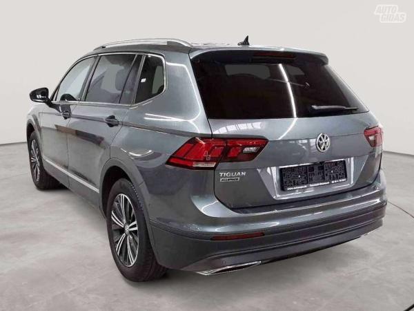 Grey Volkswagen Tiguan 2021 in Kaunas, with an engine capacity of 2.00 L and mileage of 85 thousand km for 29600 €, photo 2 on AUTOMOTO.COM.LV