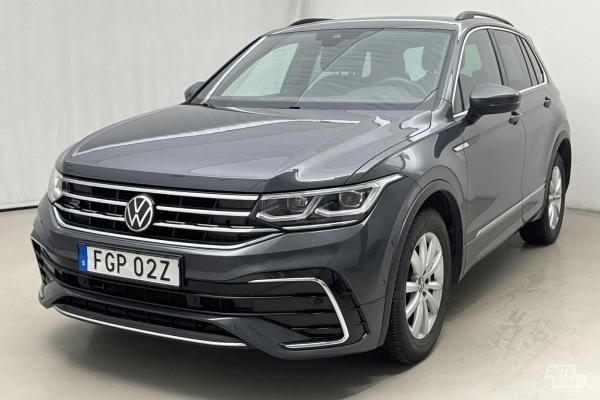 Grey Volkswagen Tiguan 2021 in Kaunas, with an engine capacity of 0.00 L and mileage of 64 thousand km for 37169 €, photo 1 on AUTOMOTO.COM.LV